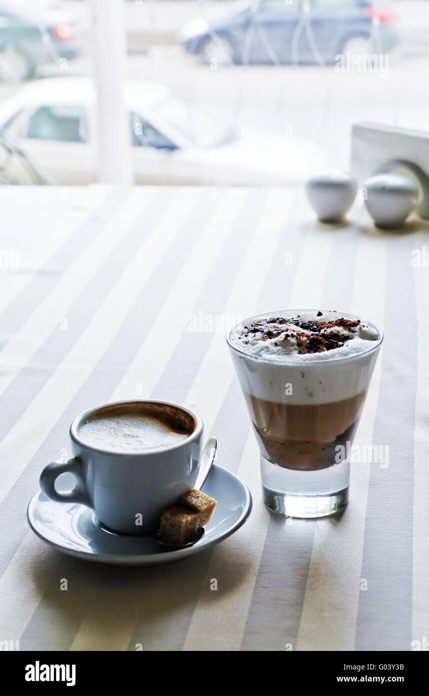Appetizing coffee with sugar on a table in modern Stock Photo - Alamy