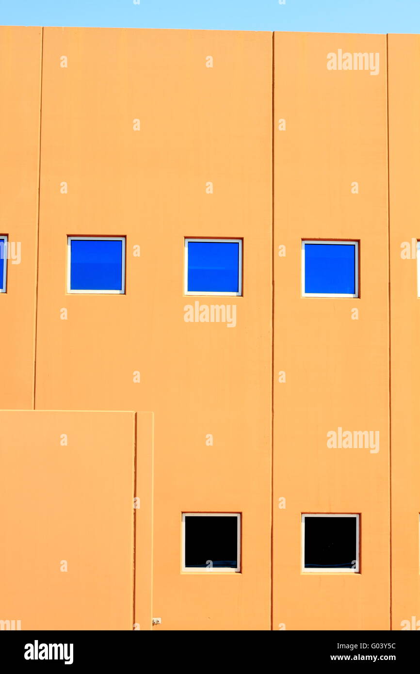 Architectural abstract of the orange colored building Stock Photo - Alamy