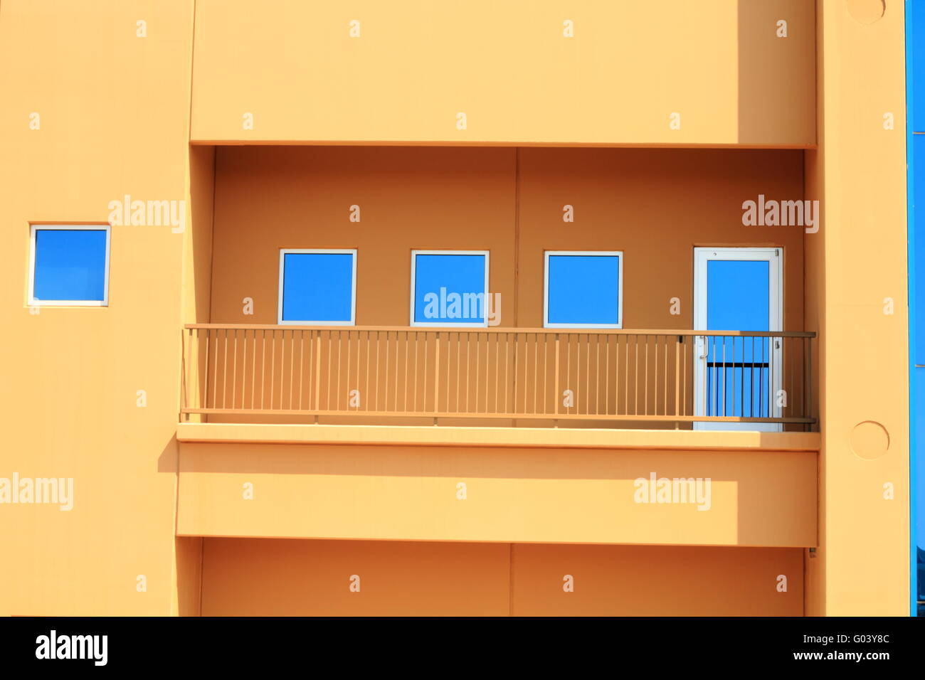 Architectural abstract of the orange colored building Stock Photo - Alamy
