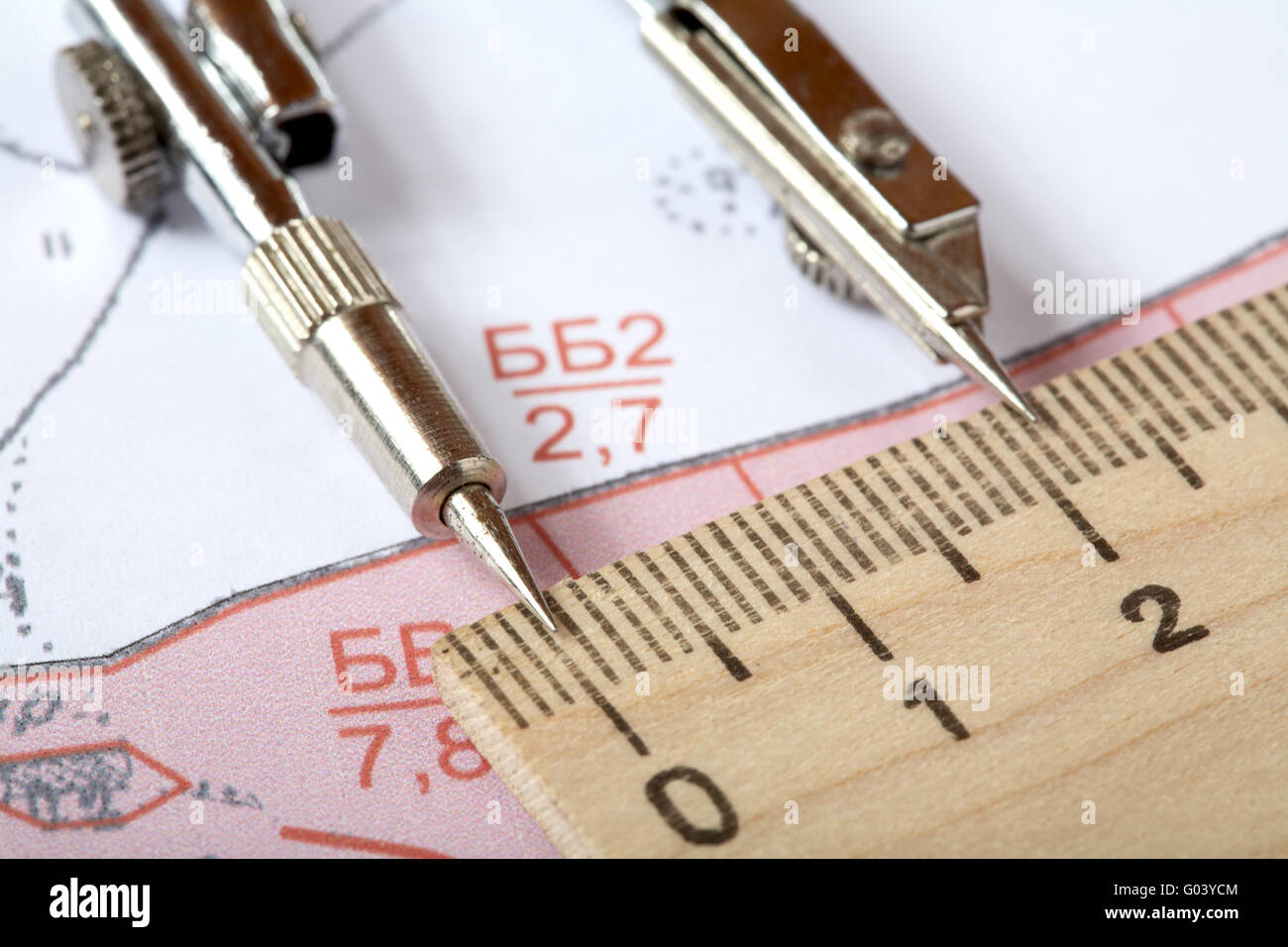 Topographic map of district with measuring instrument and a pencil ...