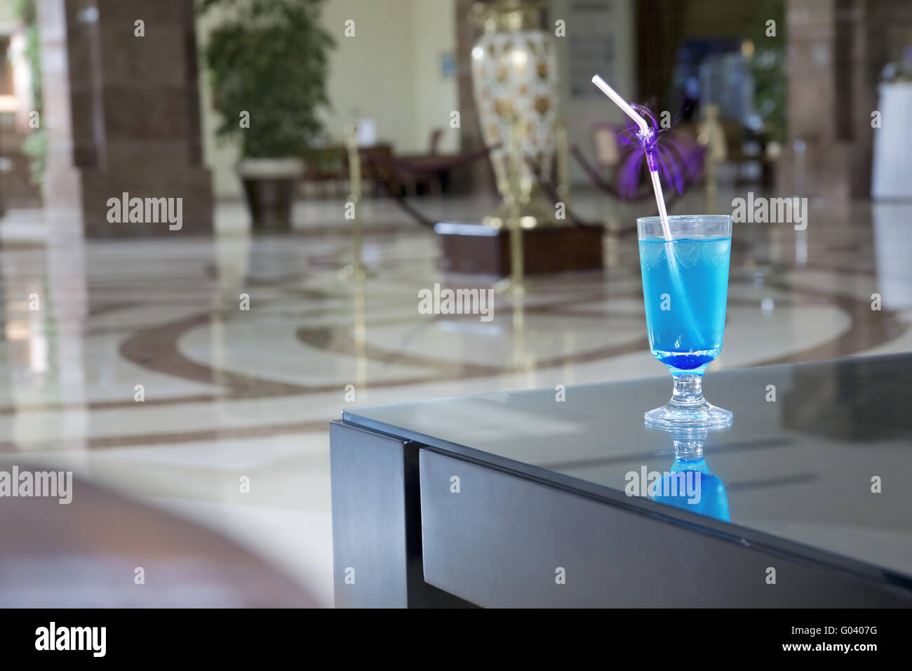 alcoholic cocktail of blue color is in the lobby o Stock Photo - Alamy