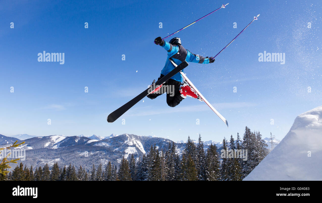 Skier in a jump Stock Photo - Alamy