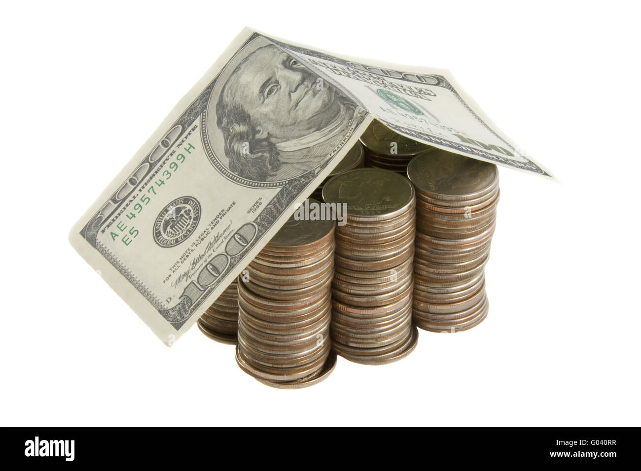Money house from coins and dollars isolated on white background Stock ...