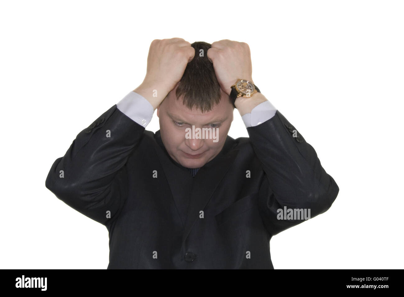 Stressed out young business man over white background Stock Photo - Alamy