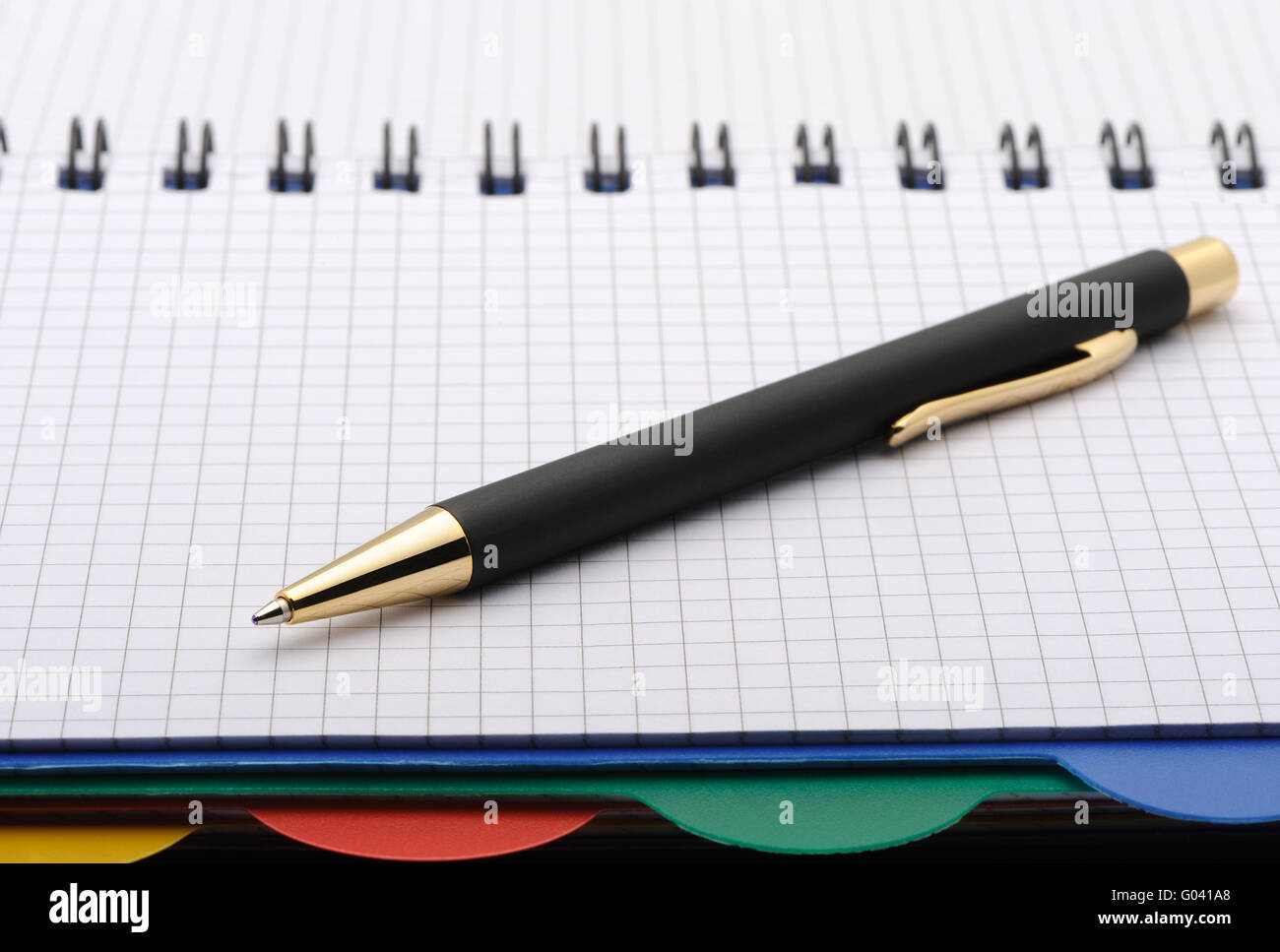 Notebook - organizer with the stylish pen.Color bookmarks Stock Photo ...