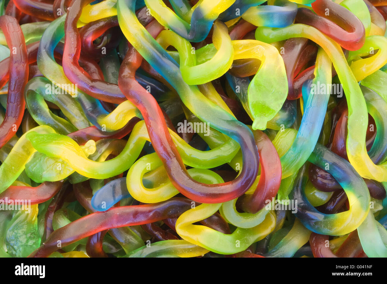 Background of jelly worms of different colors Stock Photo - Alamy