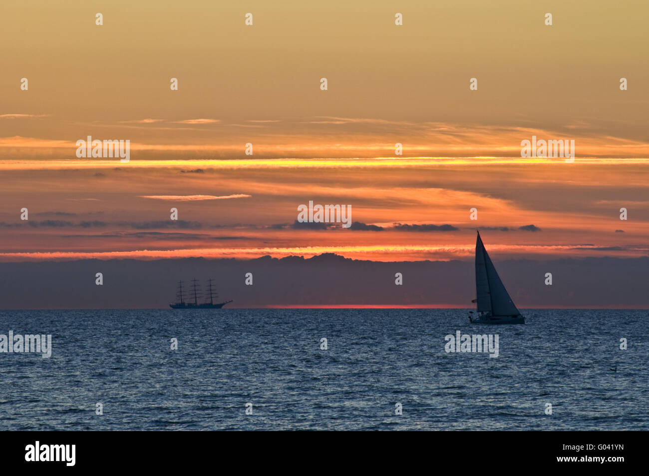 Red yellow sail hi-res stock photography and images - Alamy