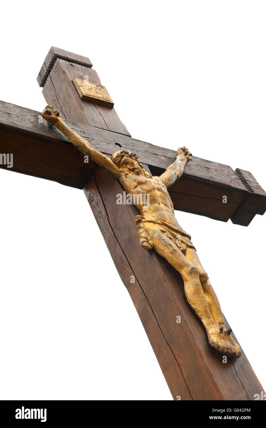 The crucifixion from a tree with Jesus's gilt figure Stock Photo - Alamy