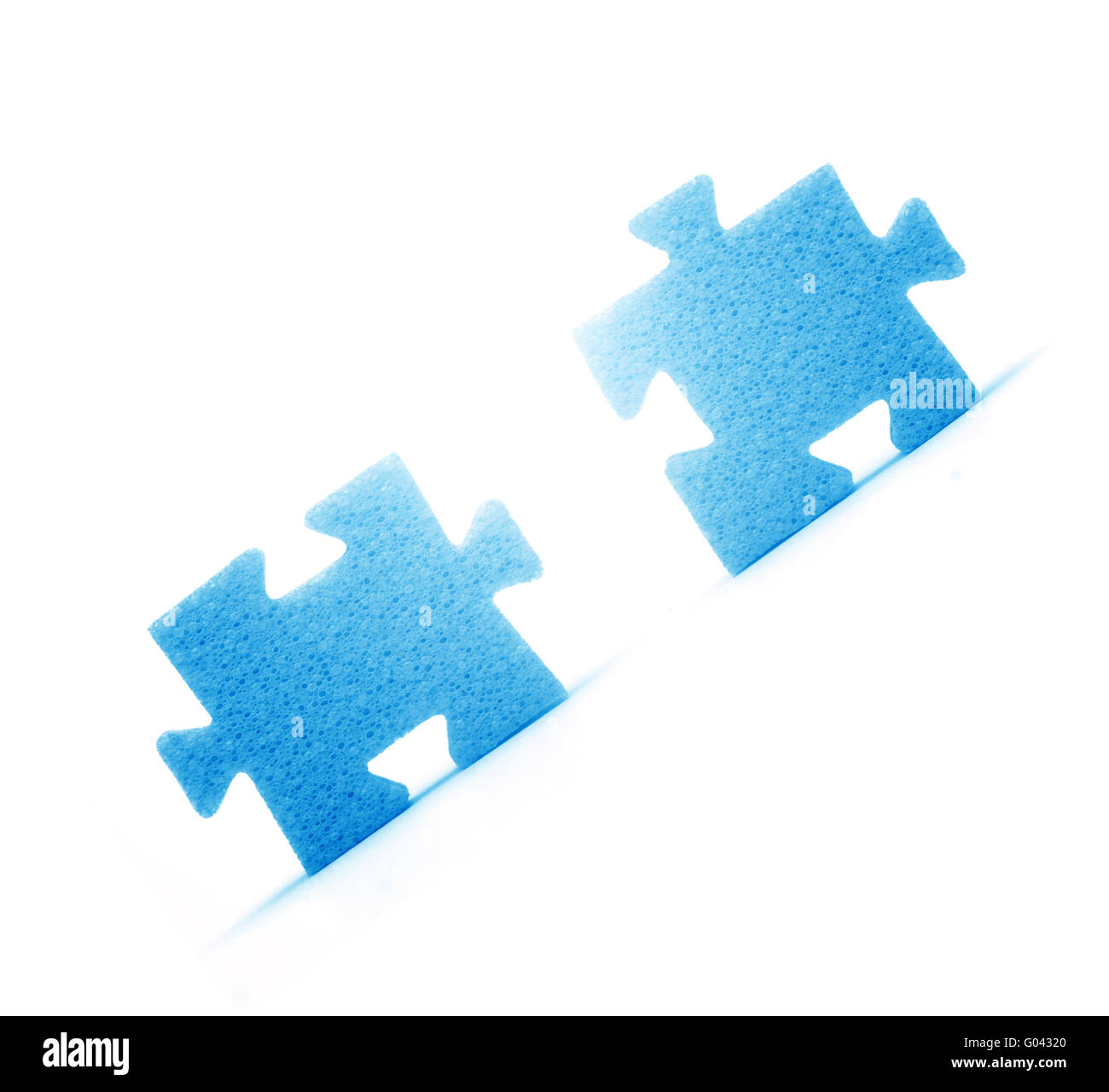 Putting two pieces of puzzles together. Conceptual image Stock Photo ...