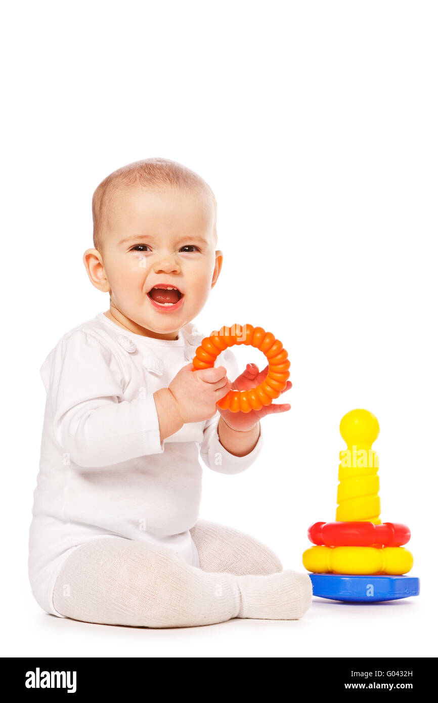 Small child play with toys on white background Stock Photo - Alamy