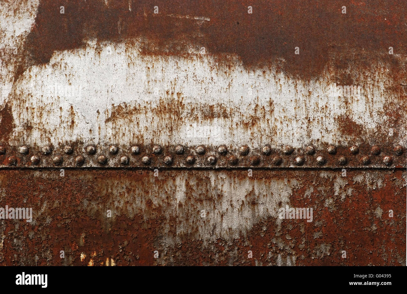 Old rusty railway cistern riveted joint as backgro Stock Photo - Alamy