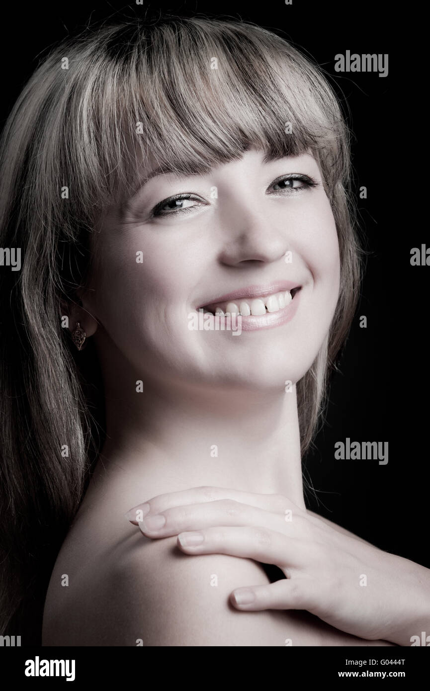 Portrait of the woman close up. The bared shoulders Stock Photo - Alamy