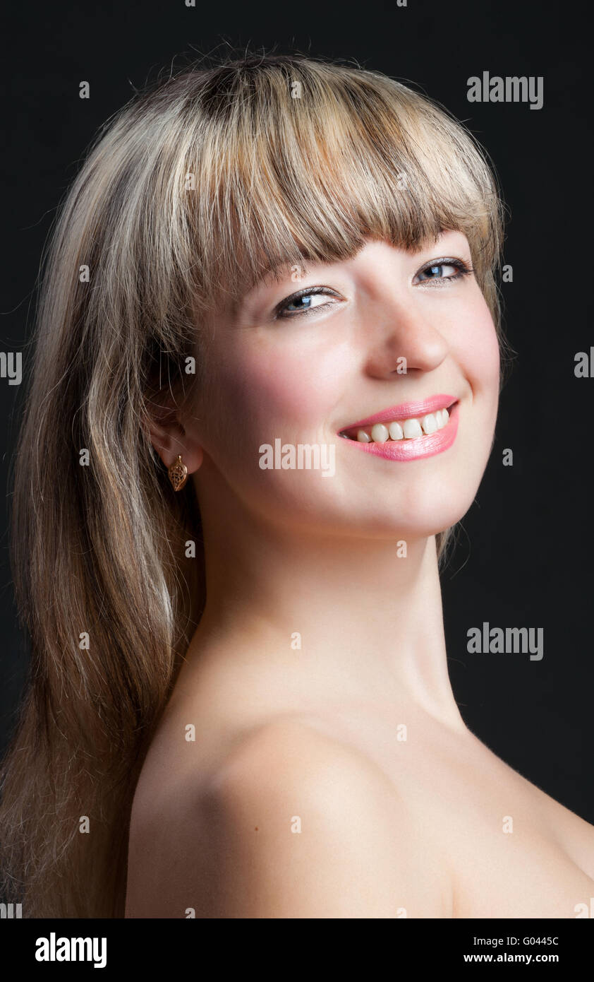 Portrait of the woman close up. The bared shoulders Stock Photo - Alamy