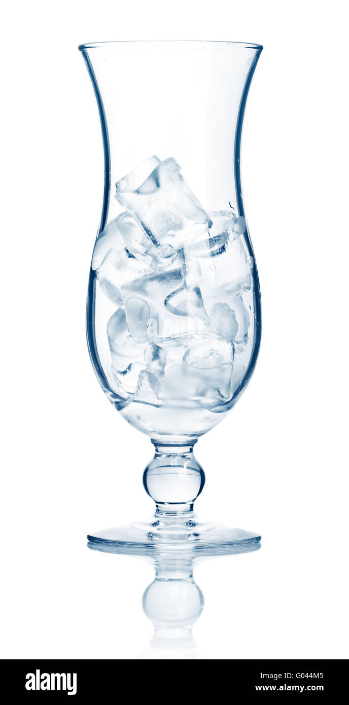 Highball cocktail glass full of ice cubes isolated Stock Photo - Alamy