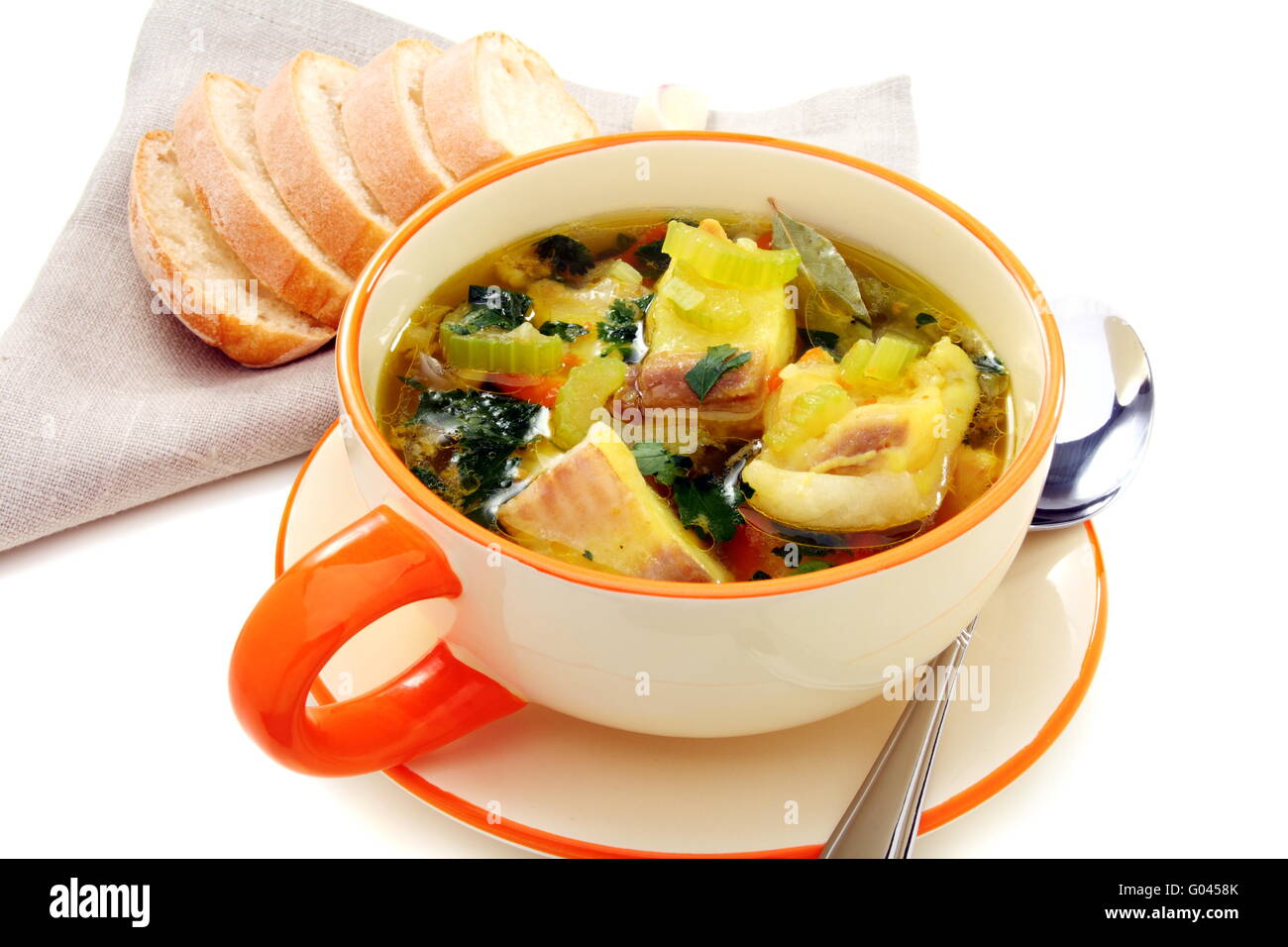Fish soup with vegetables in bowl on a white background Stock Photo - Alamy