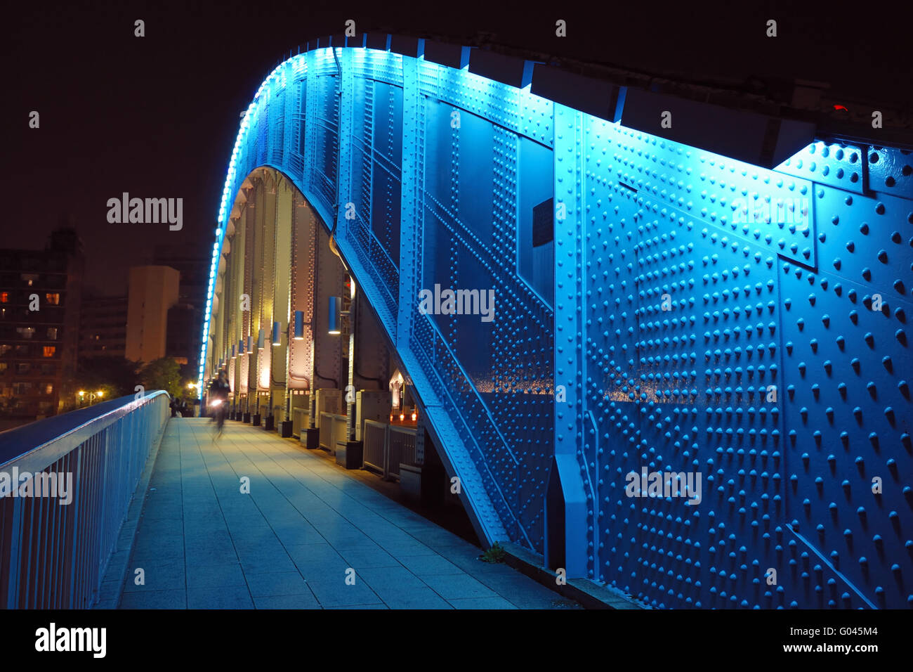 pedestrian way along the metallic arc structure of Stock Photo - Alamy