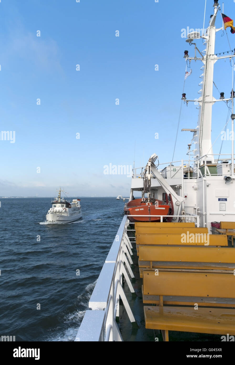 Ferry meets small ferry Stock Photo - Alamy