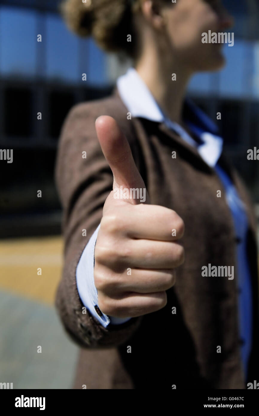 positive gesture by a hand of the business woman Stock Photo - Alamy