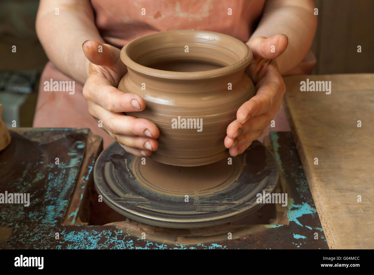 Potter shows just created a pot Stock Photo - Alamy