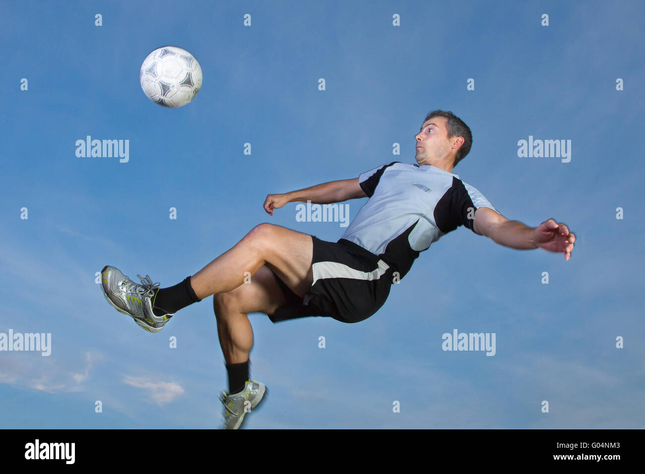 Team kicking action hi-res stock photography and images - Alamy
