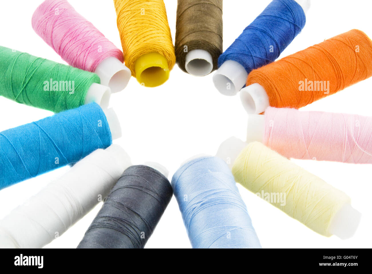 Many colorful threads over the white background Stock Photo - Alamy
