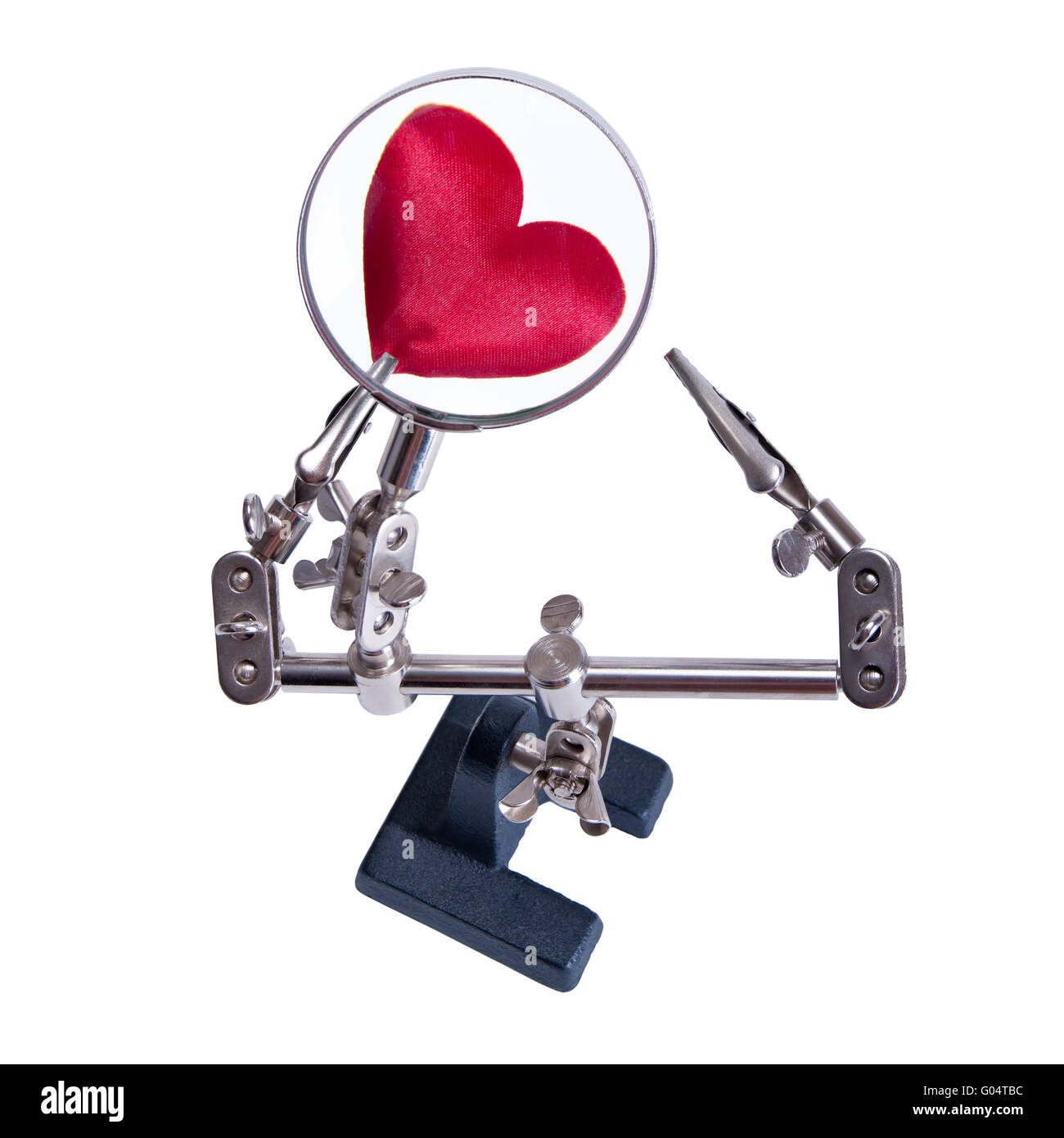 Looking a heart through a magnifying glass Stock Photo - Alamy
