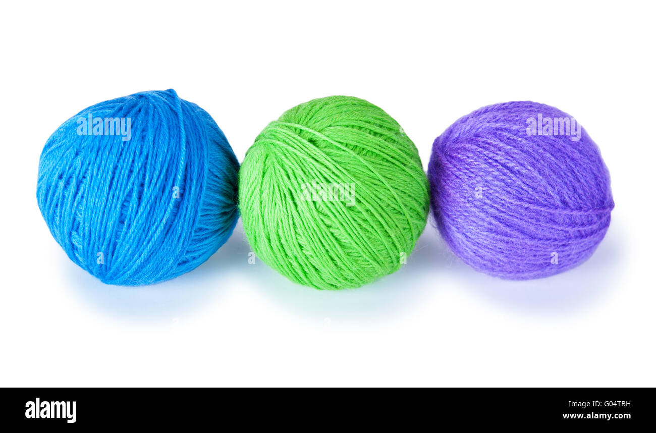 three colored woolen balls Stock Photo - Alamy