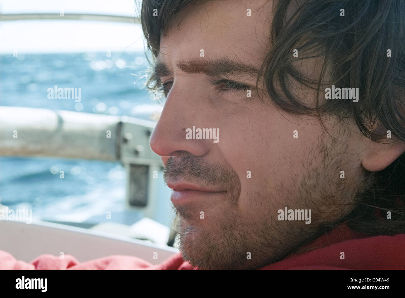 Portrait of a sailor with a tiller in the background Stock Photo - Alamy