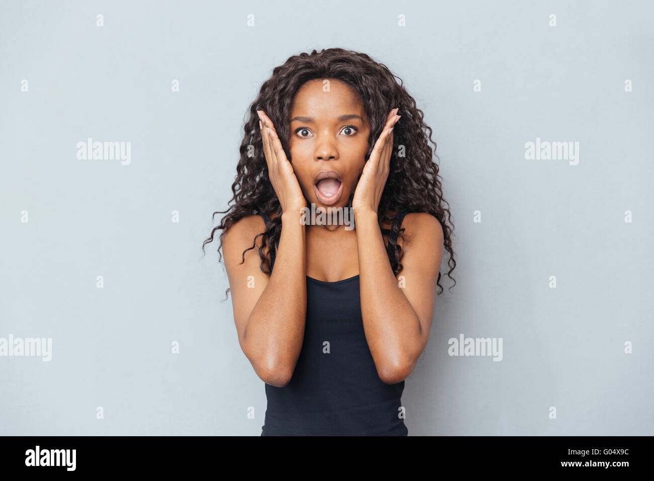 Amazed woman big eyes hi-res stock photography and images - Alamy