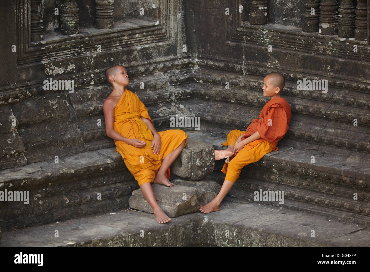 Young Buddhist monks at Angkor Wat (12th century Khmer temple), Angkor ...