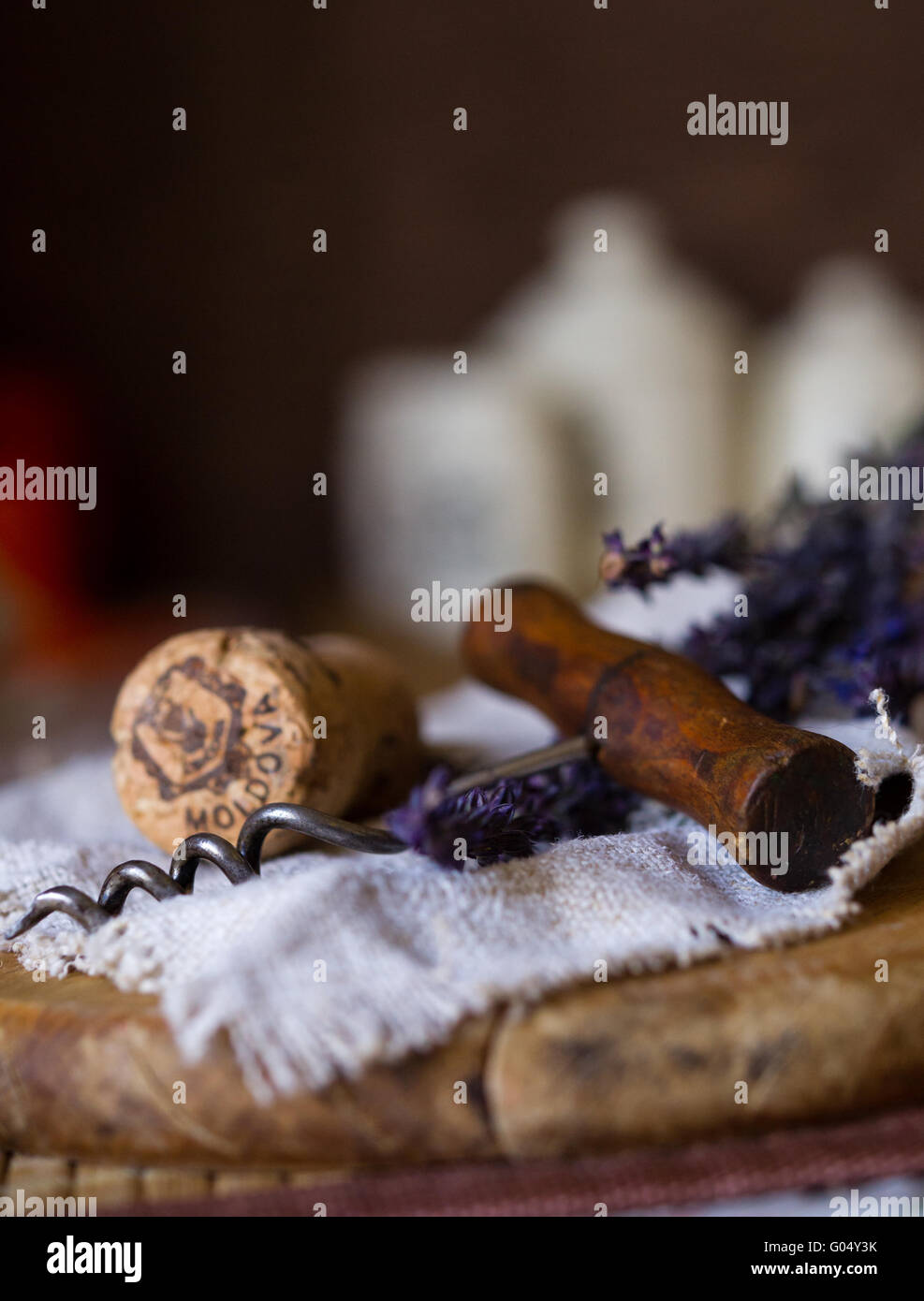 Wine cork with corkscrew on wooden board Stock Photo - Alamy