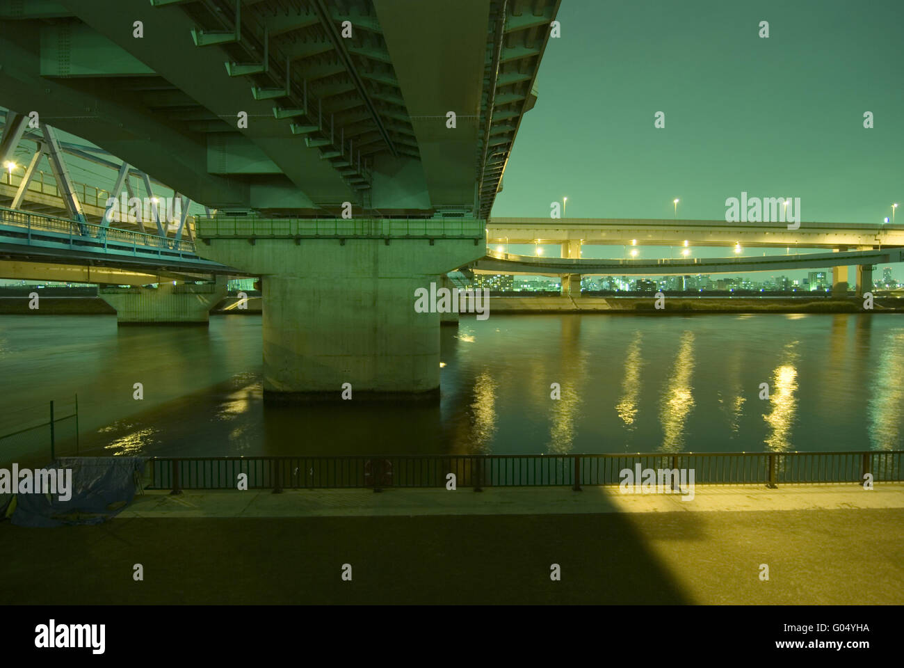huge bridges construction at acid night illuminati Stock Photo - Alamy