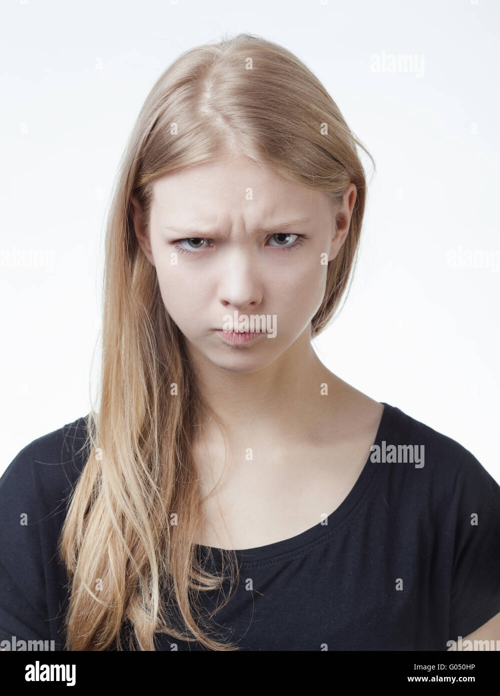 beautiful teen girl grimacing Stock Photo - Alamy