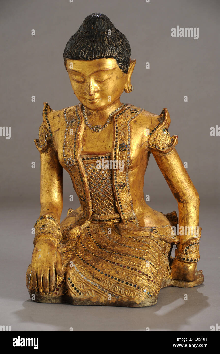 Old Burmese statue of the queen Stock Photo - Alamy
