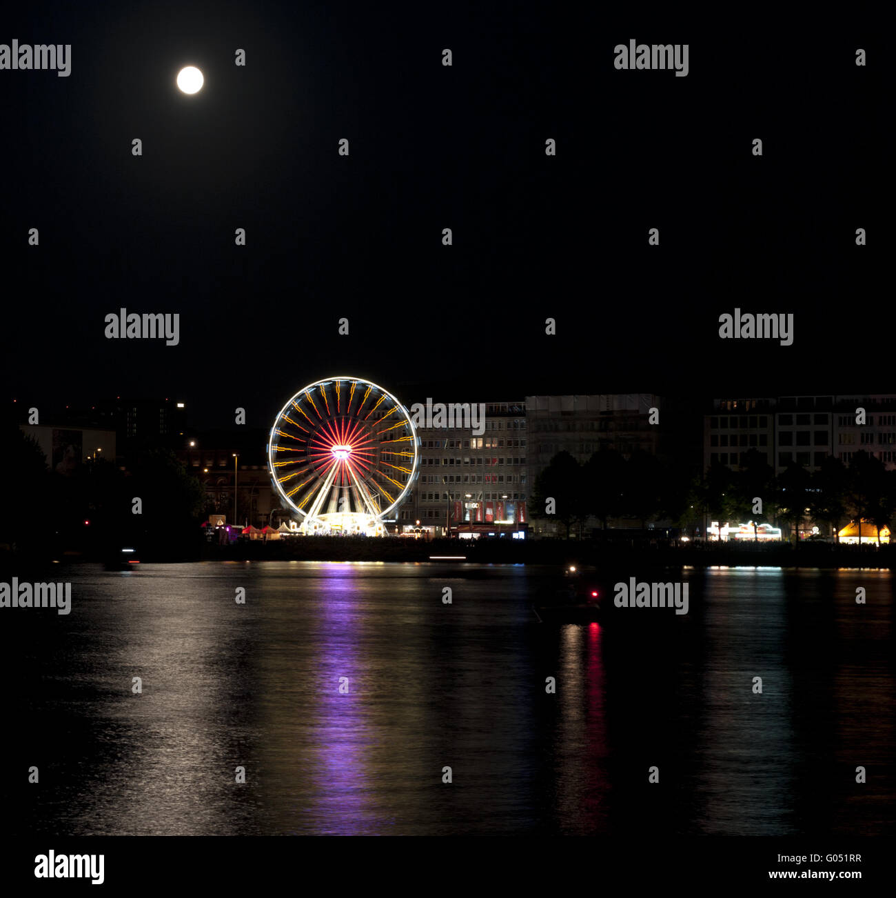 ferris wheel and moon at alster party Stock Photo - Alamy