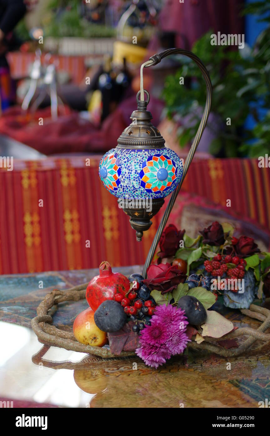 Closeup of mosaic lamp in arabic style with autumn fruits and ...