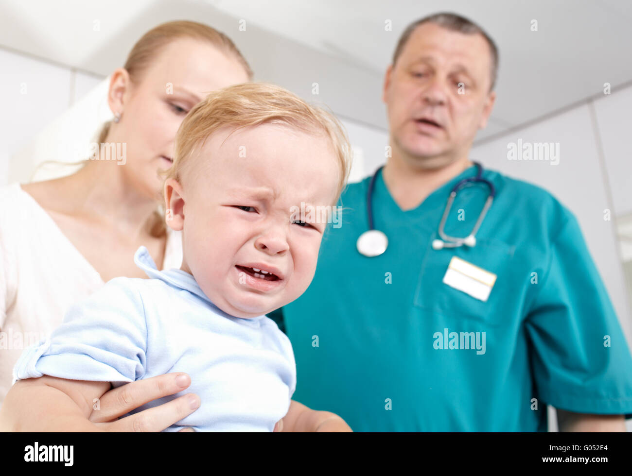 Boy is frightened and crying in a medical study Stock Photo - Alamy