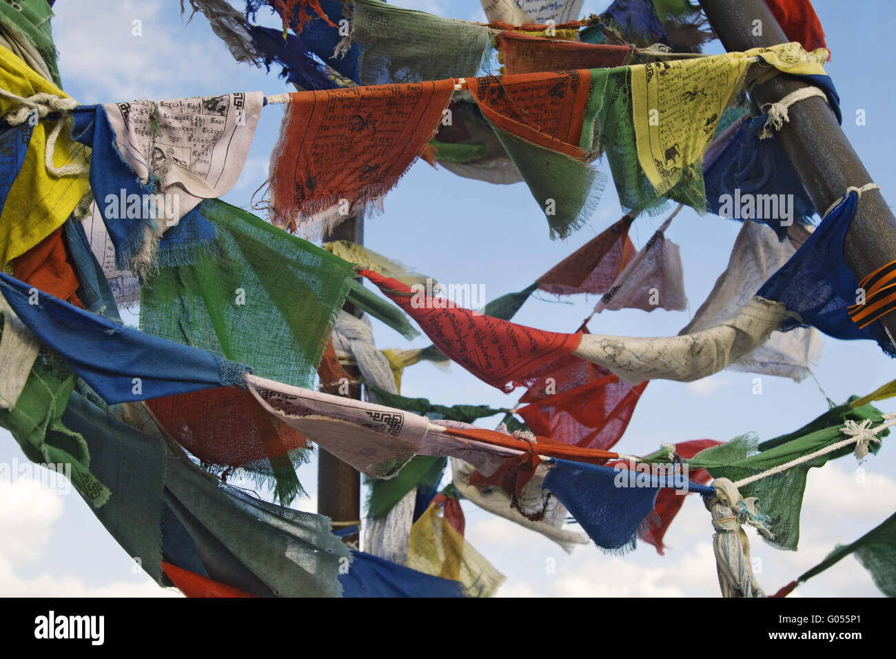 Praying flags against blue hi-res stock photography and images - Alamy