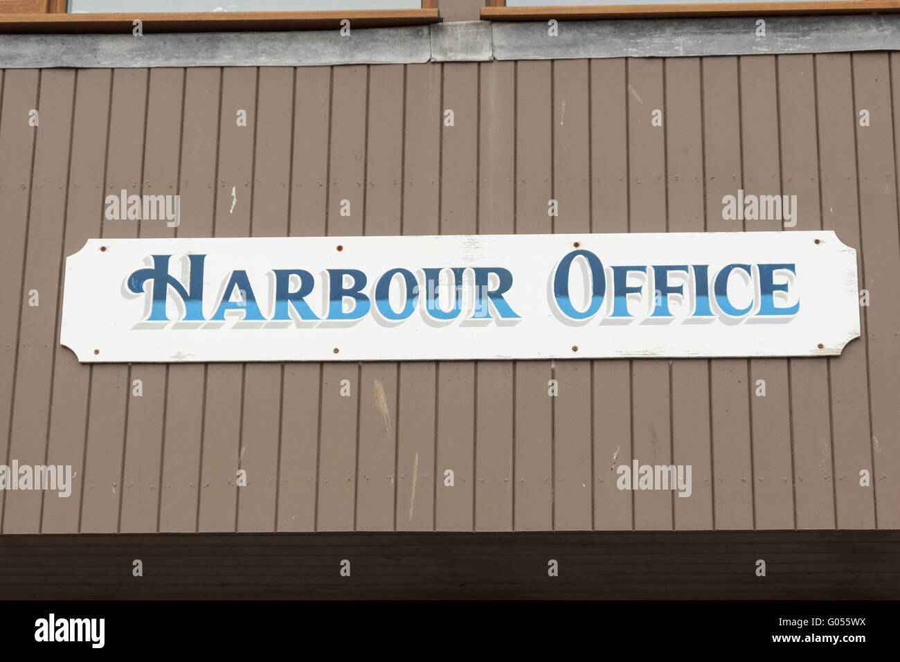 Sign Harbour office in the harbor of Seahouses Stock Photo - Alamy