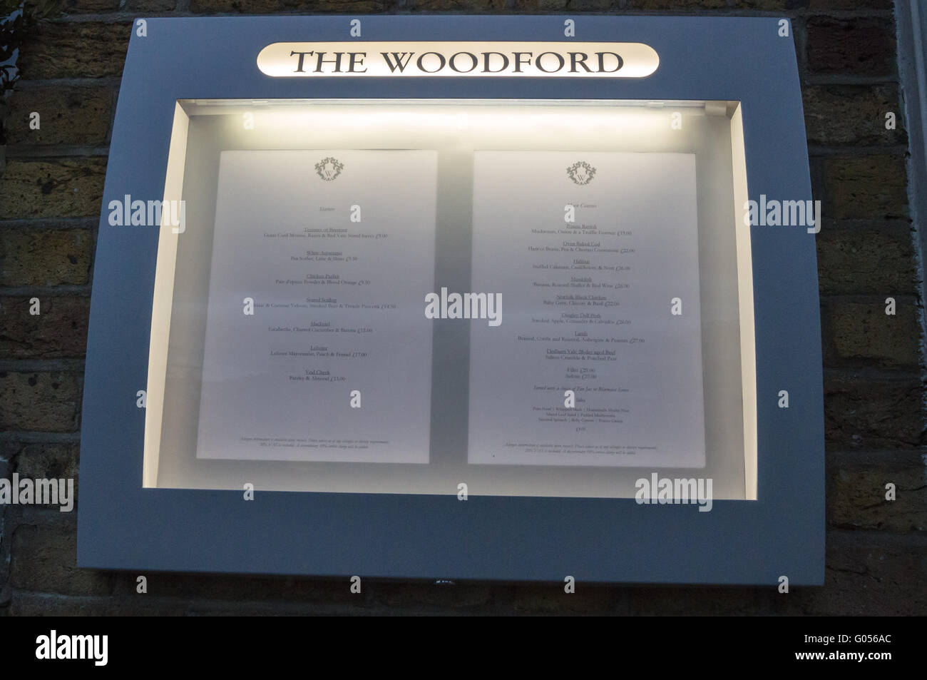 "The Woodford" restaurant menu in an illuminated cabinet, High Road ...