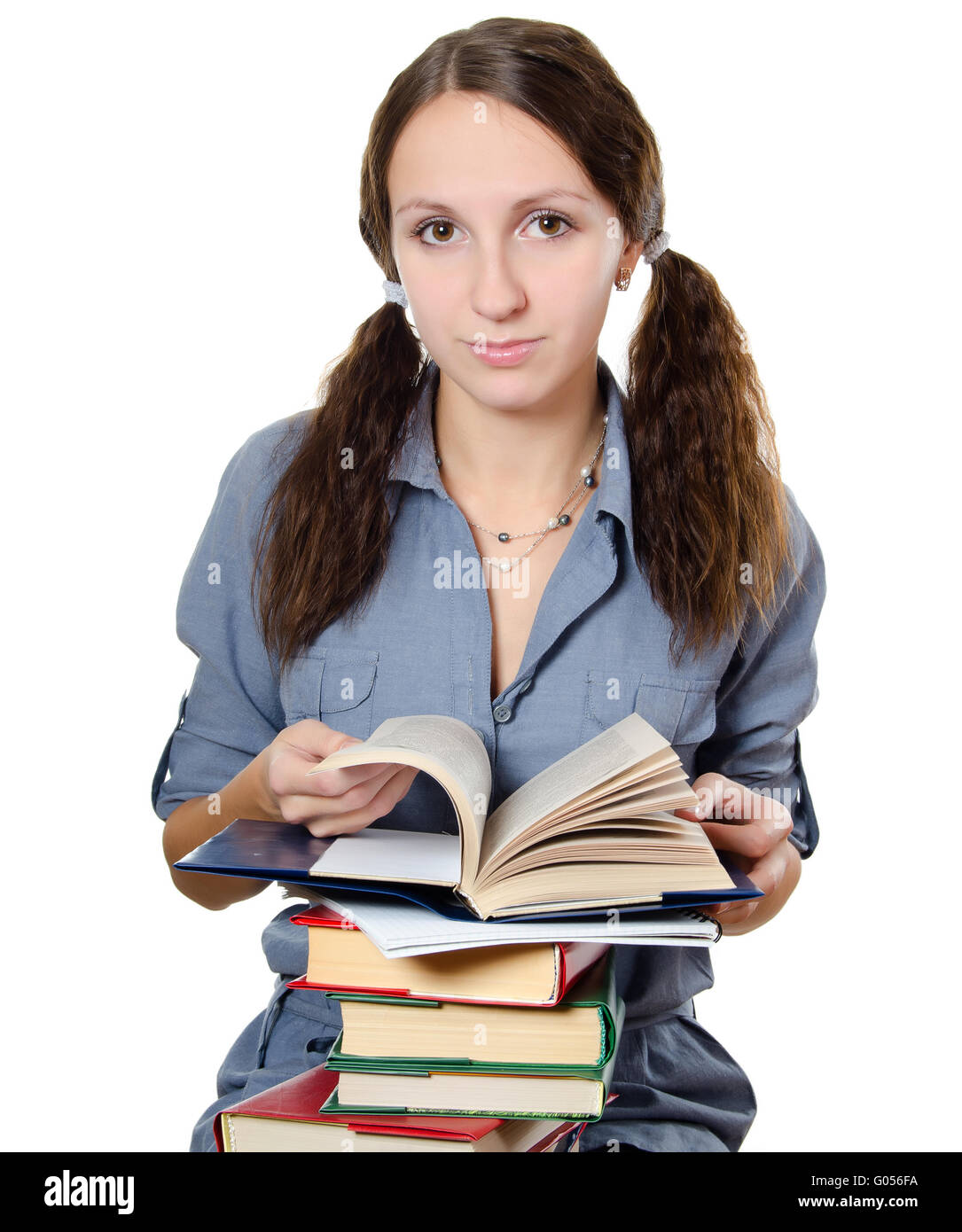 The beautiful girl with books isolated on white Stock Photo - Alamy
