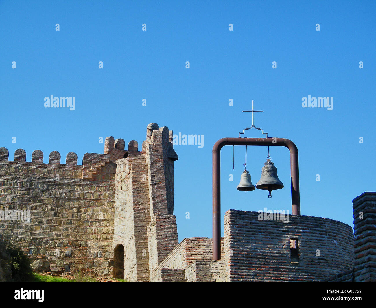 Bells on the castle wall of Tbilisi fort - Narikala Stock Photo - Alamy