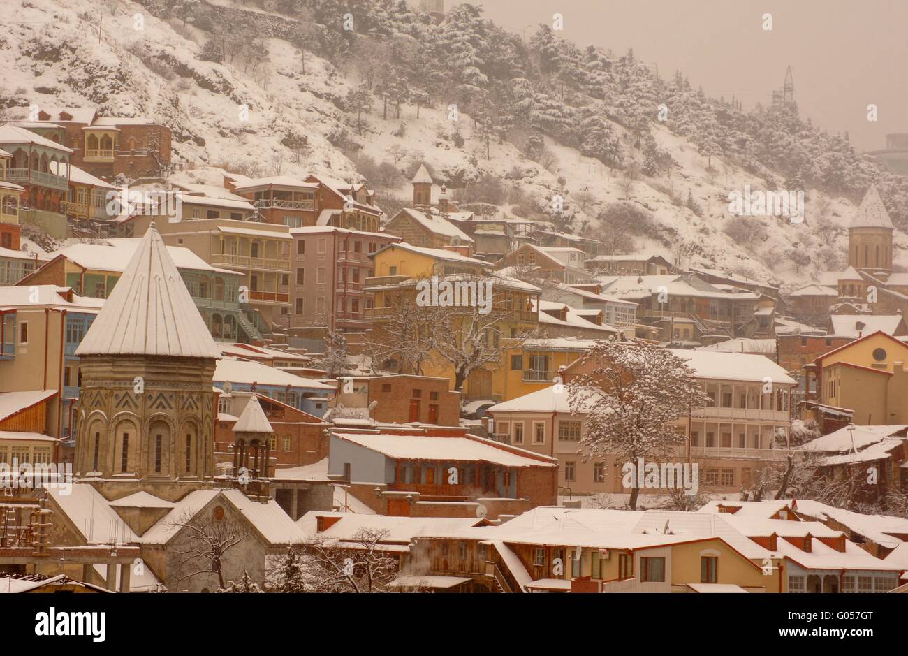 Winter view to covered with snow Tbilisi Old town in misty day Stock ...