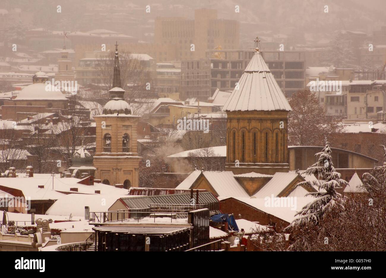 Winter view to covered with snow Tbilisi Old town in misty day Stock ...