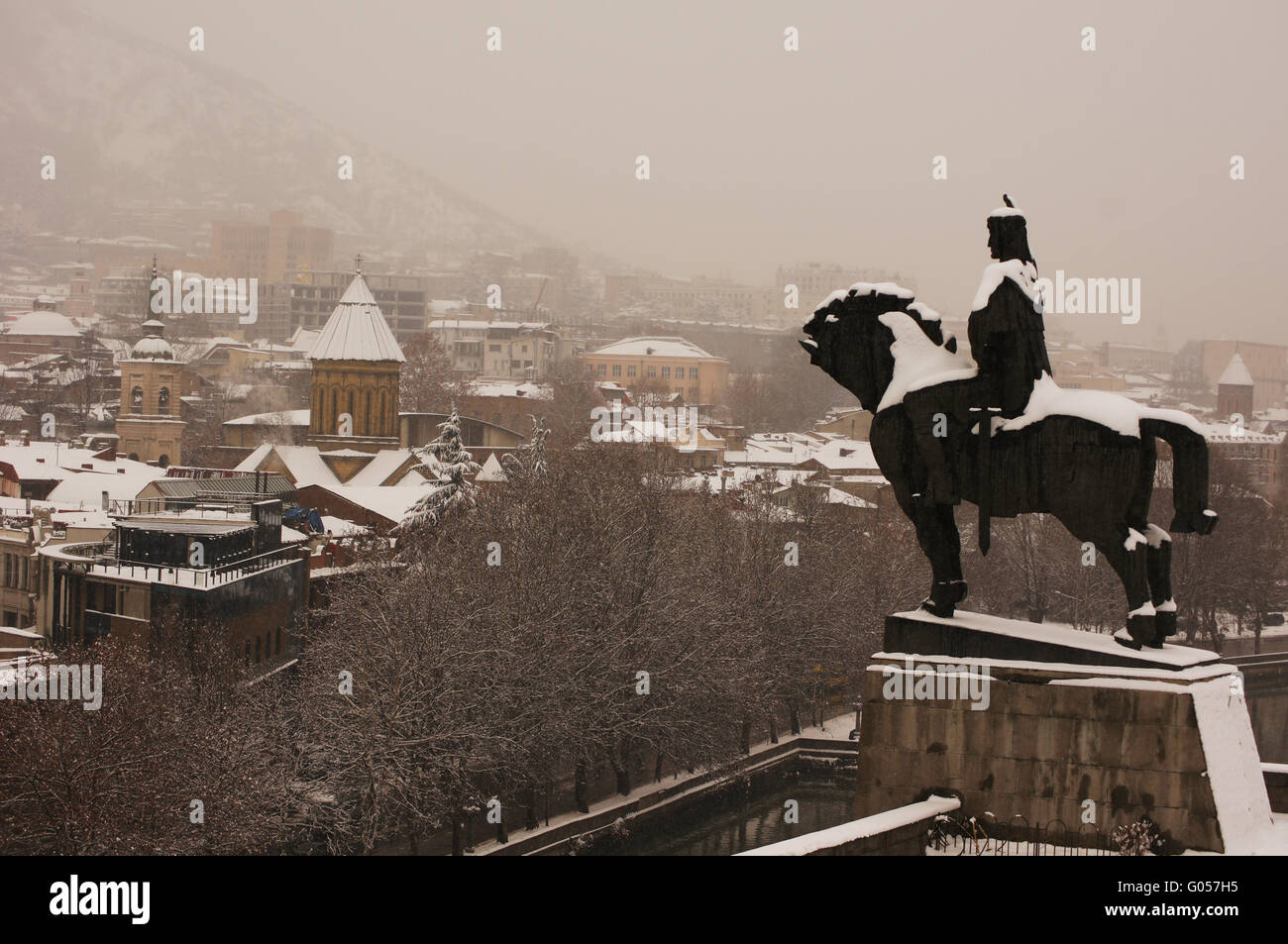 Winter view to covered with snow Tbilisi Old town in misty day Stock ...