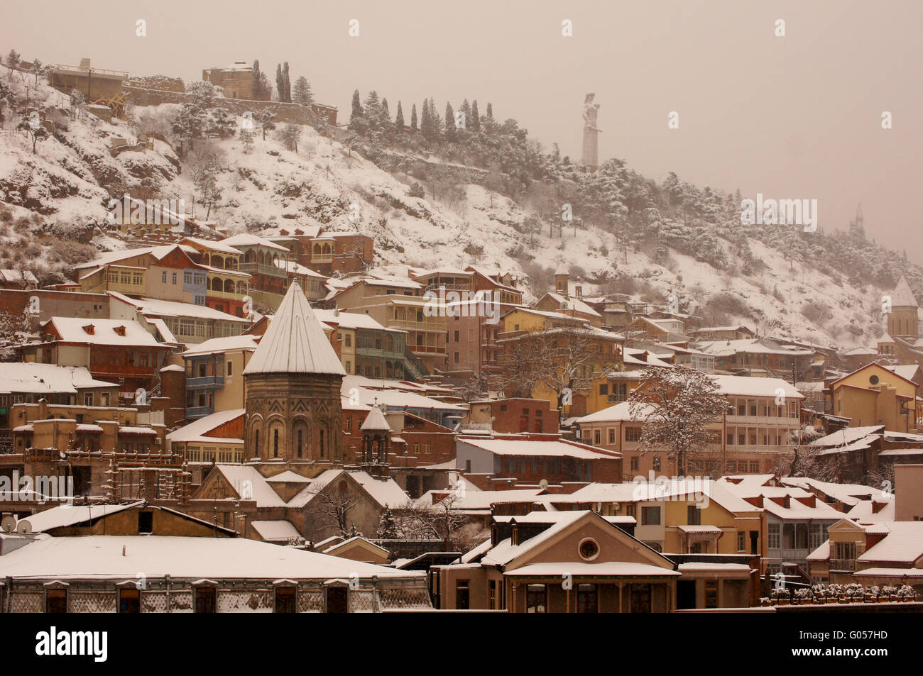 Winter view to covered with snow Tbilisi Old town in misty day Stock ...