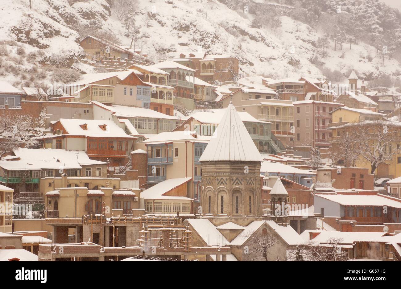 Winter view to covered with snow Tbilisi Old town in misty day Stock ...