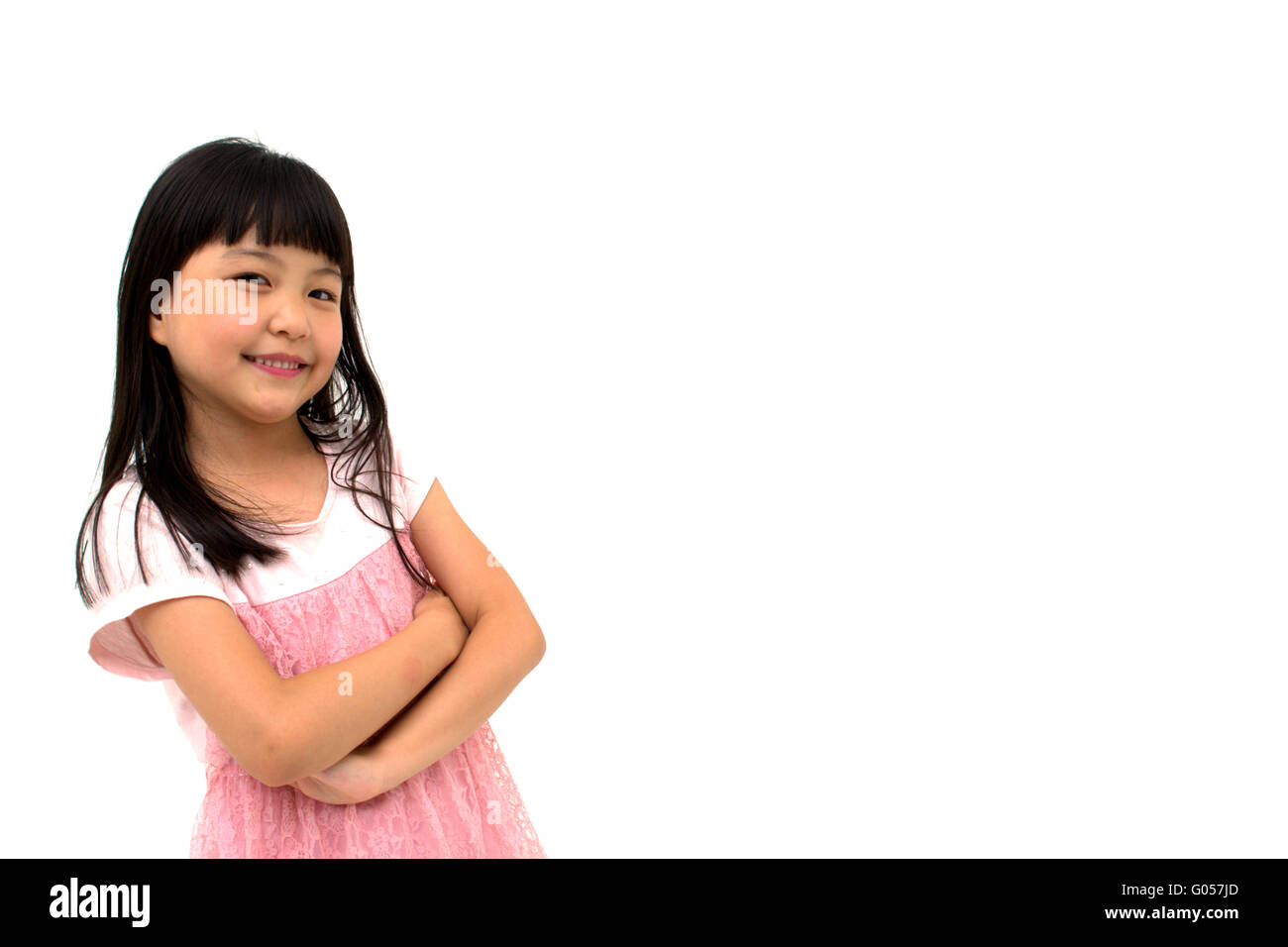 beautiful asian child with her arms crossed Stock Photo - Alamy