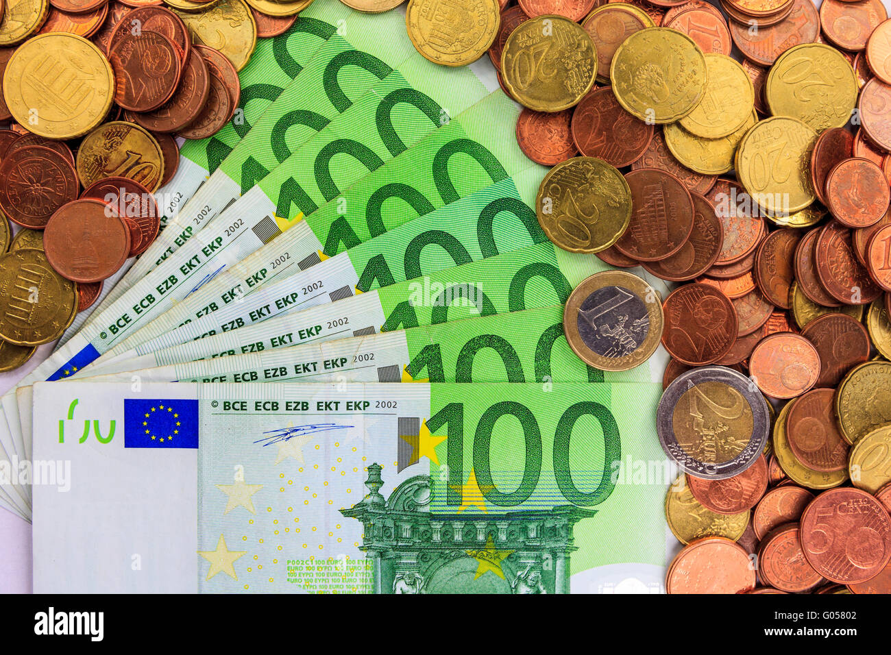 Euro notes and coins Stock Photo - Alamy