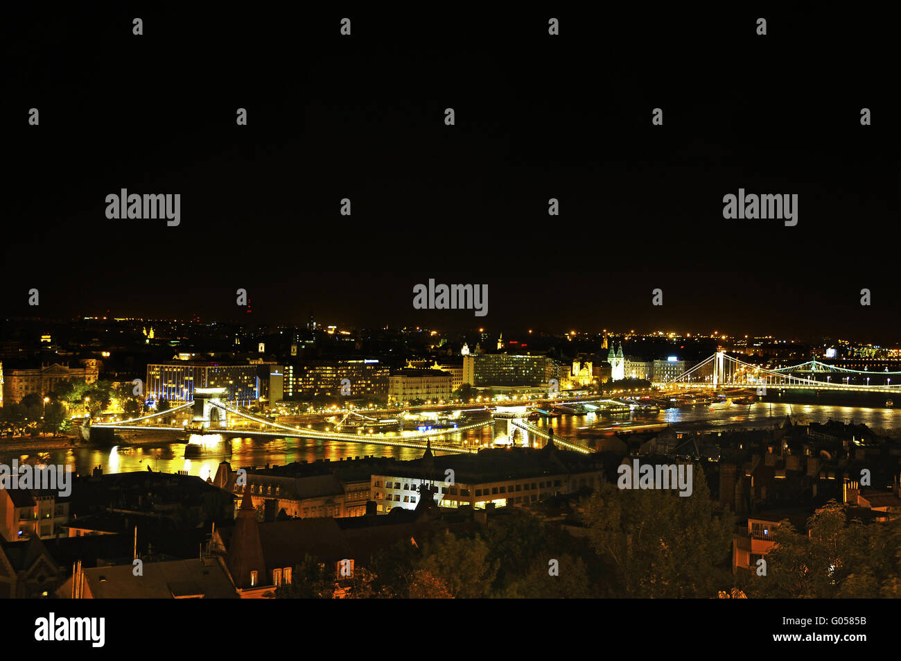 Nocturnal view of the Buda side on the Pest side o Stock Photo - Alamy